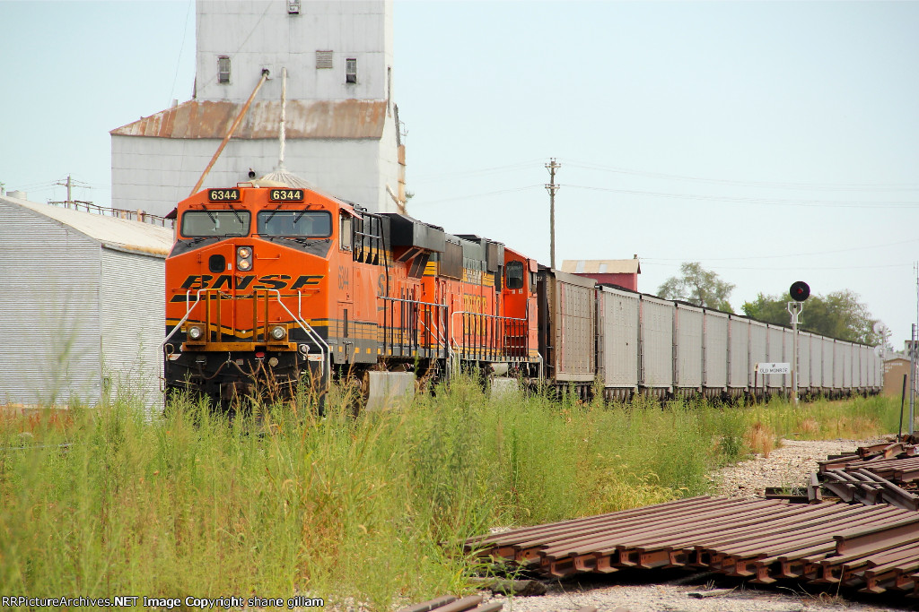 BNSF 6344 brings up dpu on this load rwsx coal.